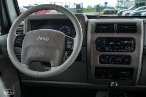 Sarkans Jeep Wrangler 2003 Marijampole, ar dzinēja tilpumu 4.00 L un nobraukumu 22 tūkst. km par 18850 €, foto 17 vietnē AUTOMOTO.COM.LV