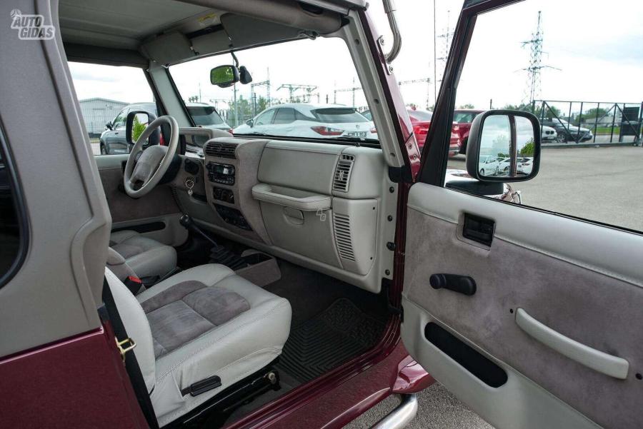 Sarkans Jeep Wrangler 2003 Marijampole, ar dzinēja tilpumu 4.00 L un nobraukumu 22 tūkst. km par 18850 €, foto 28 vietnē AUTOMOTO.COM.LV