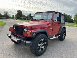 Red Jeep Wrangler 2003 in Grobiņa, with an engine capacity of 4.00 L and mileage of 280 thousand km for 12000 €, photo  on AUTOMOTO.COM.LV