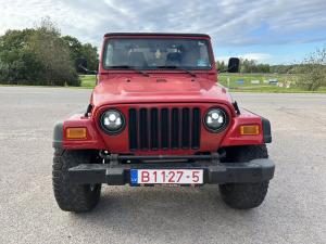 Red Jeep Wrangler 2003 in Grobiņa, with an engine capacity of 4.00 L and mileage of 280 thousand km for 12000 €, photo 3 on AUTOMOTO.COM.LV