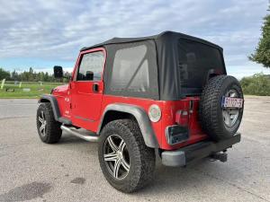 Red Jeep Wrangler 2003 in Grobiņa, with an engine capacity of 4.00 L and mileage of 280 thousand km for 12000 €, photo 5 on AUTOMOTO.COM.LV