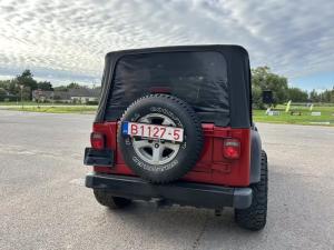 Red Jeep Wrangler 2003 in Grobiņa, with an engine capacity of 4.00 L and mileage of 280 thousand km for 12000 €, photo 7 on AUTOMOTO.COM.LV