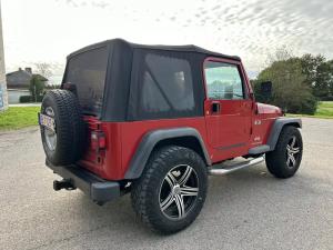 Red Jeep Wrangler 2003 in Grobiņa, with an engine capacity of 4.00 L and mileage of 280 thousand km for 12000 €, photo 8 on AUTOMOTO.COM.LV