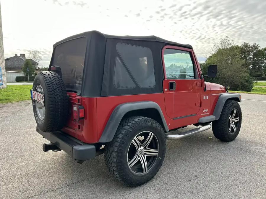 Red Jeep Wrangler 2003 in Grobiņa, with an engine capacity of 4.00 L and mileage of 280 thousand km for 12000 €, photo 8 on AUTOMOTO.COM.LV