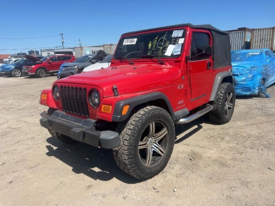 Red Jeep Wrangler 2003 in Riga, with an engine capacity of 4.00 L and mileage of 280 thousand km for 12000 €, photo 3 on AUTOMOTO.COM.LV