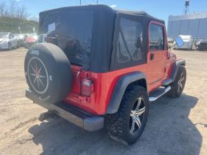 Red Jeep Wrangler 2003 in Riga, with an engine capacity of 4.00 L and mileage of 280 thousand km for 12000 €, photo 4 on AUTOMOTO.COM.LV