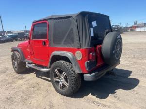 Red Jeep Wrangler 2003 in Riga, with an engine capacity of 4.00 L and mileage of 280 thousand km for 12000 €, photo 5 on AUTOMOTO.COM.LV