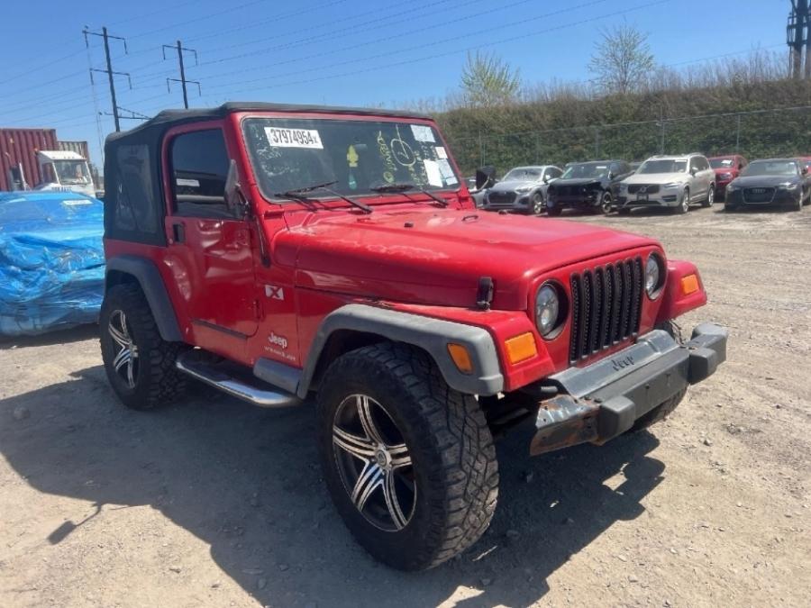 Red Jeep Wrangler 2003 in Riga, with an engine capacity of 4.00 L and mileage of 280 thousand km for 12000 €, photo 6 on AUTOMOTO.COM.LV