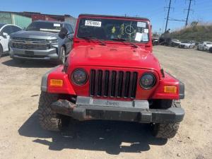Red Jeep Wrangler 2003 in Riga, with an engine capacity of 4.00 L and mileage of 280 thousand km for 12000 €, photo 8 on AUTOMOTO.COM.LV