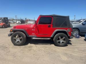 Red Jeep Wrangler 2003 in Riga, with an engine capacity of 4.00 L and mileage of 280 thousand km for 12000 €, photo 9 on AUTOMOTO.COM.LV