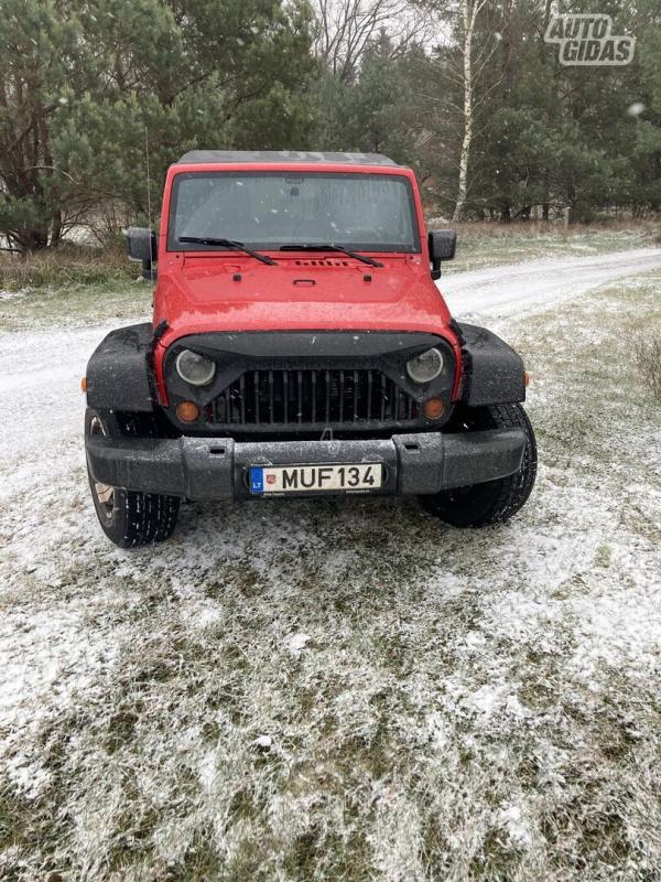 Sarkans Jeep Wrangler 2013 Jonava, ar dzinēja tilpumu 3.60 L un nobraukumu 268 tūkst. km par 16000 €, foto 1 vietnē AUTOMOTO.COM.LV