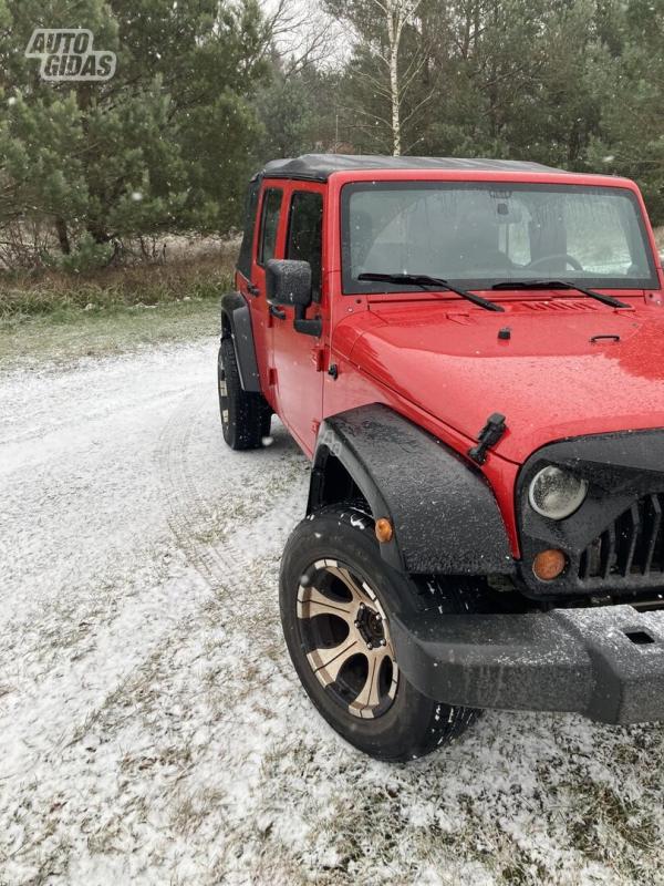 Sarkans Jeep Wrangler 2013 Jonava, ar dzinēja tilpumu 3.60 L un nobraukumu 268 tūkst. km par 16000 €, foto 2 vietnē AUTOMOTO.COM.LV