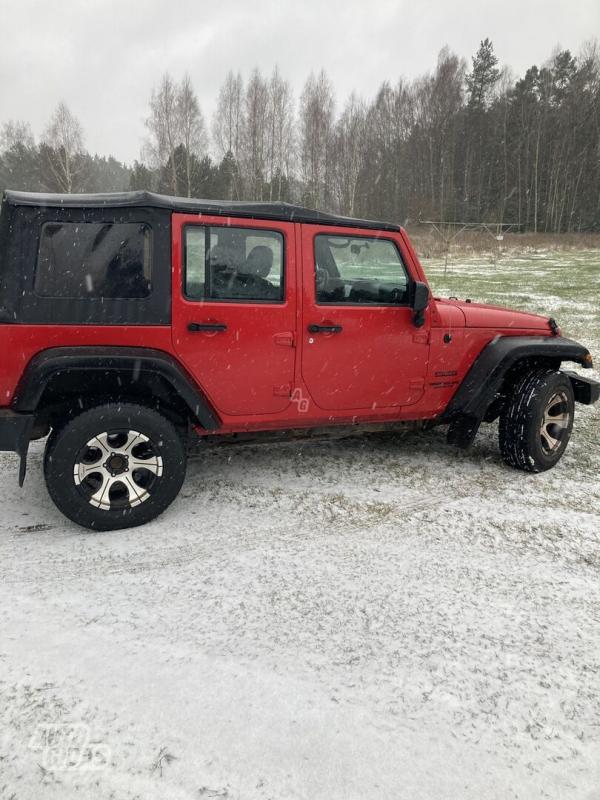 Sarkans Jeep Wrangler 2013 Jonava, ar dzinēja tilpumu 3.60 L un nobraukumu 268 tūkst. km par 16000 €, foto 3 vietnē AUTOMOTO.COM.LV