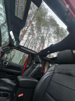 Red Jeep Wrangler 2018 in Vilnius, with an engine capacity of 2.00 L and mileage of 160 thousand km for 28500 €, photo 15 on AUTOMOTO.COM.LV