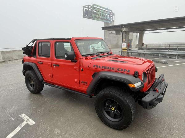 Red Jeep Wrangler 2020 in Vilnius, with an engine capacity of 3.60 L and mileage of 93 thousand km for 32900 €, photo 1 on AUTOMOTO.COM.LV