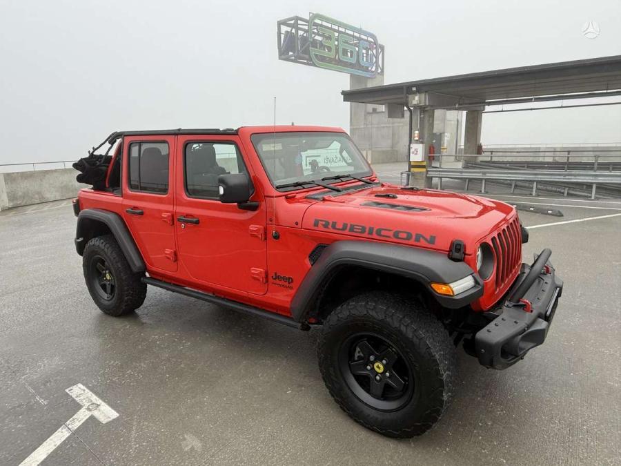 Sarkans Jeep Wrangler 2020 Viļņa, ar dzinēja tilpumu 3.60 L un nobraukumu 93 tūkst. km par 32900 €, foto 1 vietnē AUTOMOTO.COM.LV
