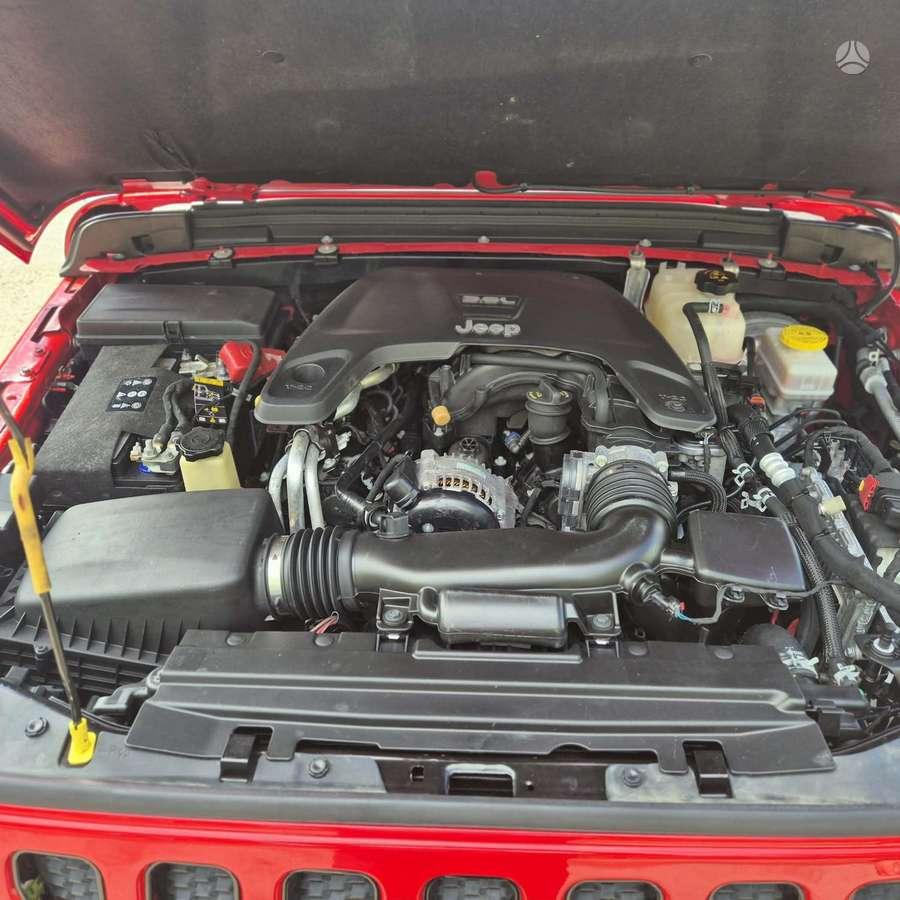 Red Jeep Wrangler 2020 in Kazlu Ruda, with an engine capacity of 3.60 L and mileage of 92 thousand km for 34900 €, photo 16 on AUTOMOTO.COM.LV