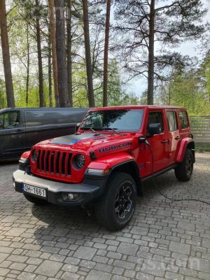 Sarkans Jeep Wrangler 2022 Rīga, ar dzinēja tilpumu 2.00 L un nobraukumu 47 tūkst. km par 55000 €, foto  vietnē AUTOMOTO.COM.LV