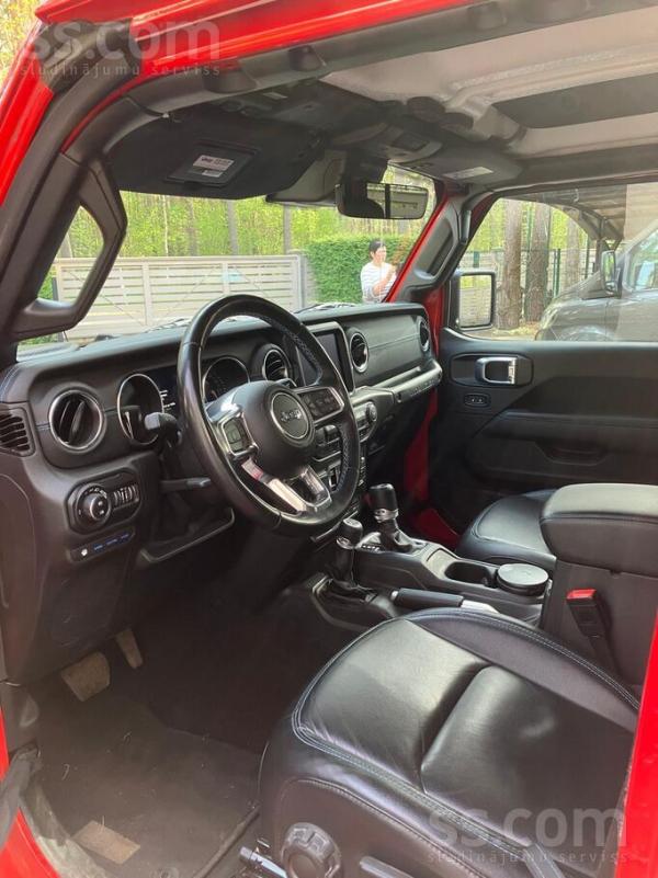 Red Jeep Wrangler 2022 in Riga, with an engine capacity of 2.00 L and mileage of 47 thousand km for 55000 €, photo 4 on AUTOMOTO.COM.LV