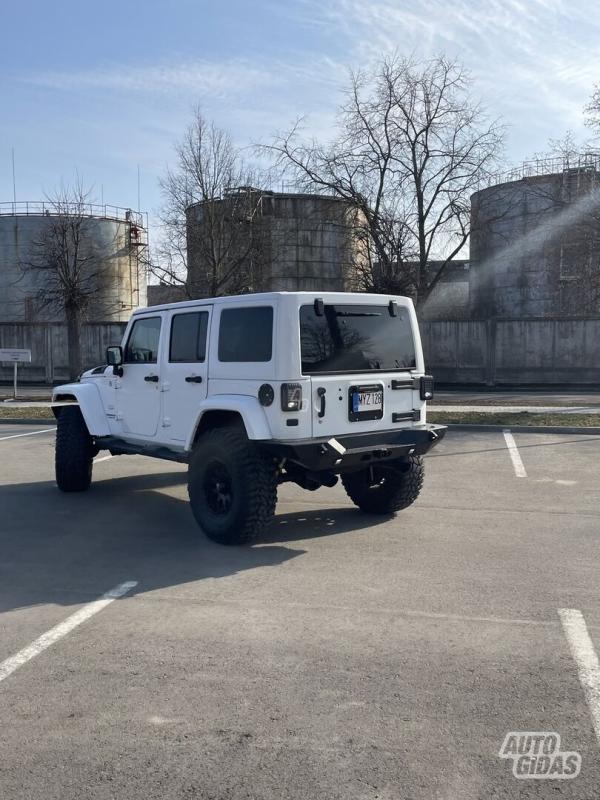 Balts Jeep Wrangler 2014 Panevēža, ar dzinēja tilpumu 3.60 L un nobraukumu 106 tūkst. km par 25999 €, foto 3 vietnē AUTOMOTO.COM.LV