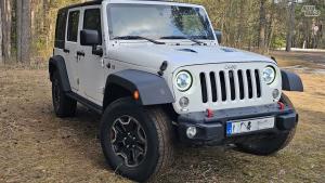Balts Jeep Wrangler 2015 Viļņa, ar dzinēja tilpumu 3.60 L un nobraukumu 103 tūkst. km par 22000 €, foto  vietnē AUTOMOTO.COM.LV