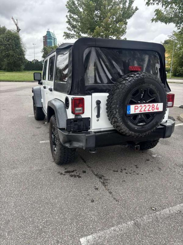 White Jeep Wrangler 2015 in Klaipeda, with an engine capacity of 3.60 L and mileage of 267 thousand km for 7999 €, photo 5 on AUTOMOTO.COM.LV