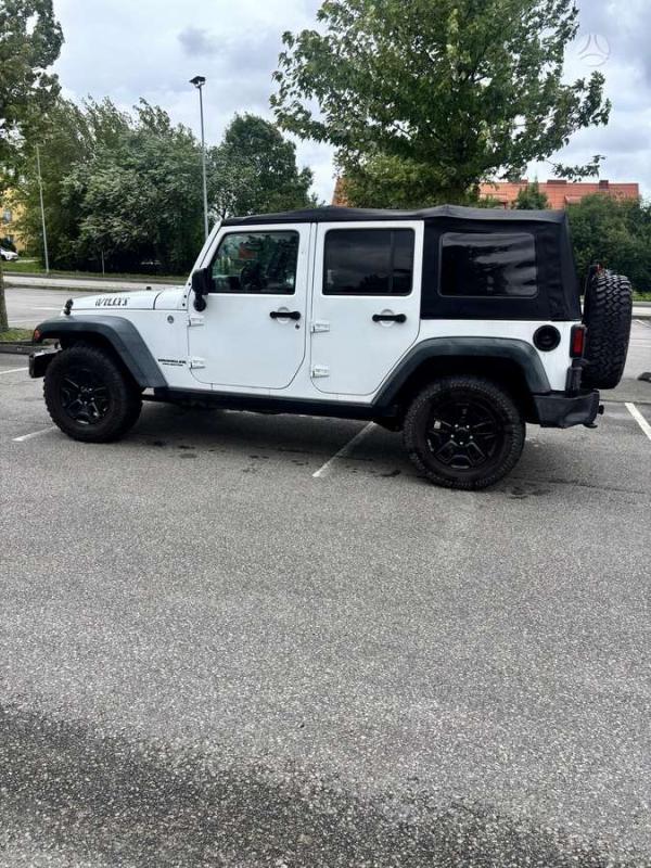 White Jeep Wrangler 2015 in Klaipeda, with an engine capacity of 3.60 L and mileage of 267 thousand km for 7999 €, photo 6 on AUTOMOTO.COM.LV