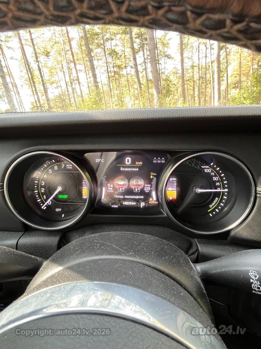 White Jeep Wrangler 2021 in Tallinn, with an engine capacity of 2.00 L and mileage of 140 thousand km for 44900 €, photo 17 on AUTOMOTO.COM.LV