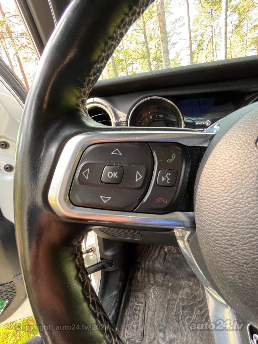White Jeep Wrangler 2021 in Tallinn, with an engine capacity of 2.00 L and mileage of 140 thousand km for 44900 €, photo 23 on AUTOMOTO.COM.LV