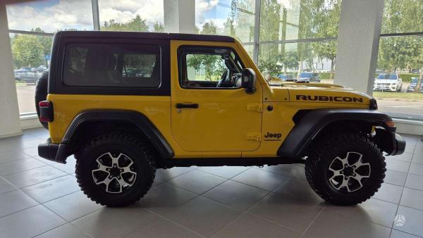 Dzeltens Jeep Wrangler 2020 Marijampole, ar dzinēja tilpumu 2.14 L un nobraukumu 74 tūkst. km par 33999 €, foto 7 vietnē AUTOMOTO.COM.LV
