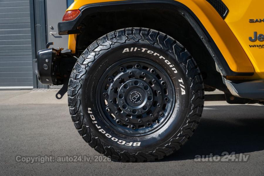 Yellow Jeep Wrangler 2020 in Tallinn, with an engine capacity of 2.10 L and mileage of 148 thousand km for 41990 €, photo 5 on AUTOMOTO.COM.LV