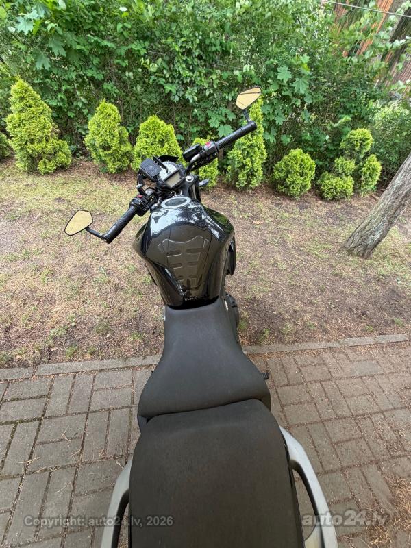 Black Kawasaki ER-6N 2016 in Tallinn, with an engine capacity of 0.65 L and mileage of 32 thousand km for 3000 €, photo 7 on AUTOMOTO.COM.LV