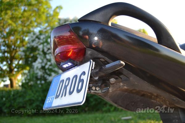 Sarkans Kawasaki ER-6N 2007 Jehvi, ar dzinēja tilpumu 0.65 L un nobraukumu 32 tūkst. km par 2600 €, foto 7 vietnē AUTOMOTO.COM.LV