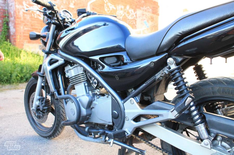 Melns Kawasaki ER 2005 Viļņa, ar dzinēja tilpumu 0.50 L un nobraukumu 29 tūkst. km par 1750 €, foto 14 vietnē AUTOMOTO.COM.LV