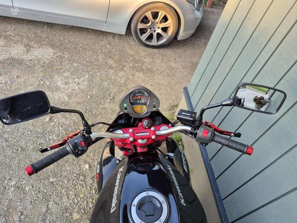 Black Kawasaki ER 2005 in Kursenai, with an engine capacity of 0.65 L and mileage of 7 thousand km for 2399 €, photo 10 on AUTOMOTO.COM.LV