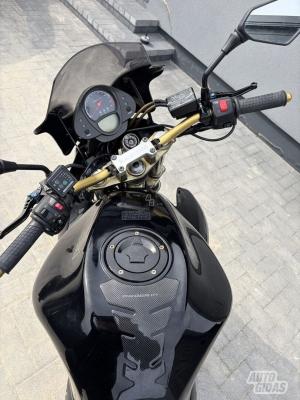 Melns Kawasaki ER 2006 Šauļi, ar dzinēja tilpumu 0.65 L un nobraukumu 27 tūkst. km par 2200 €, foto 4 vietnē AUTOMOTO.COM.LV
