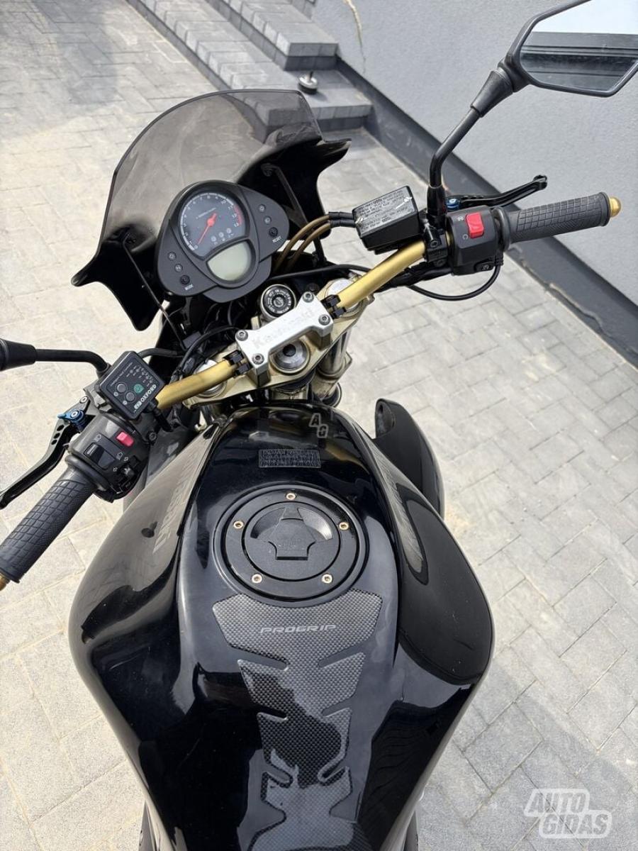 Melns Kawasaki ER 2006 Šauļi, ar dzinēja tilpumu 0.65 L un nobraukumu 27 tūkst. km par 2200 €, foto 4 vietnē AUTOMOTO.COM.LV
