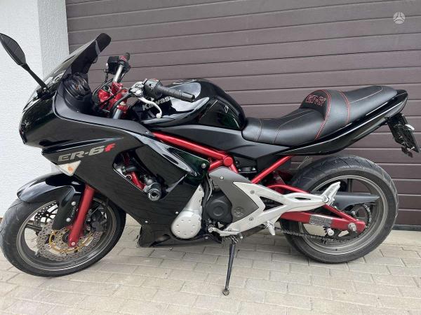 Melns Kawasaki ER 2006 Alīta, ar dzinēja tilpumu 0.65 L un nobraukumu 32 tūkst. km par 2600 €, foto 1 vietnē AUTOMOTO.COM.LV