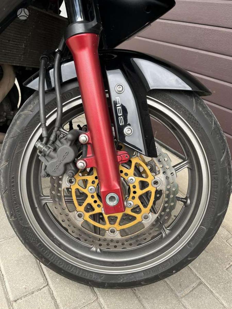 Melns Kawasaki ER 2006 Alīta, ar dzinēja tilpumu 0.65 L un nobraukumu 32 tūkst. km par 2600 €, foto 7 vietnē AUTOMOTO.COM.LV