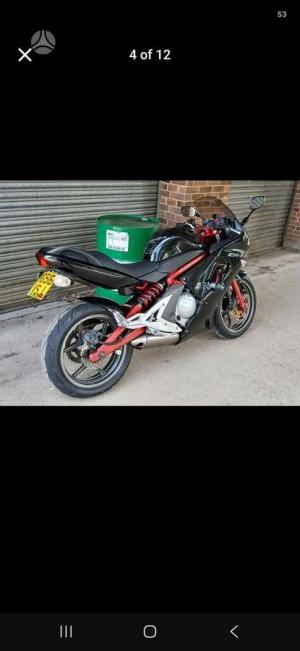 Black Kawasaki ER 2006 in Rokiskis, with an engine capacity of 0.65 L and mileage of 25 thousand km for 2800 €, photo 4 on AUTOMOTO.COM.LV