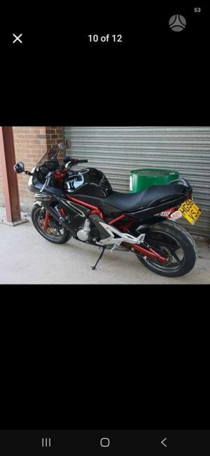 Black Kawasaki ER 2006 in Rokiskis, with an engine capacity of 0.65 L and mileage of 25 thousand km for 2800 €, photo 8 on AUTOMOTO.COM.LV