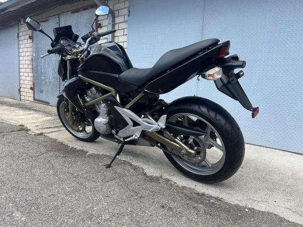 Black Kawasaki ER 2007 in Birstonas, with an engine capacity of 0.65 L and mileage of 24 thousand km for 2350 €, photo 6 on AUTOMOTO.COM.LV