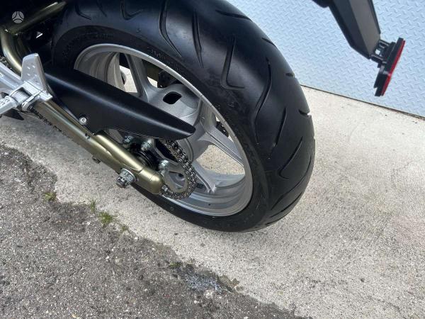 Black Kawasaki ER 2007 in Birstonas, with an engine capacity of 0.65 L and mileage of 24 thousand km for 2350 €, photo 8 on AUTOMOTO.COM.LV