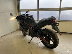 Black Kawasaki ER 2007 in Radviliskis, with an engine capacity of 0.65 L and mileage of 63 thousand km for 1650 €, photo 5 on AUTOMOTO.COM.LV