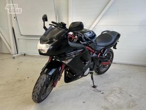 Black Kawasaki ER 2007 in Radviliskis, with an engine capacity of 0.65 L and mileage of 63 thousand km for 1650 €, photo  on AUTOMOTO.COM.LV