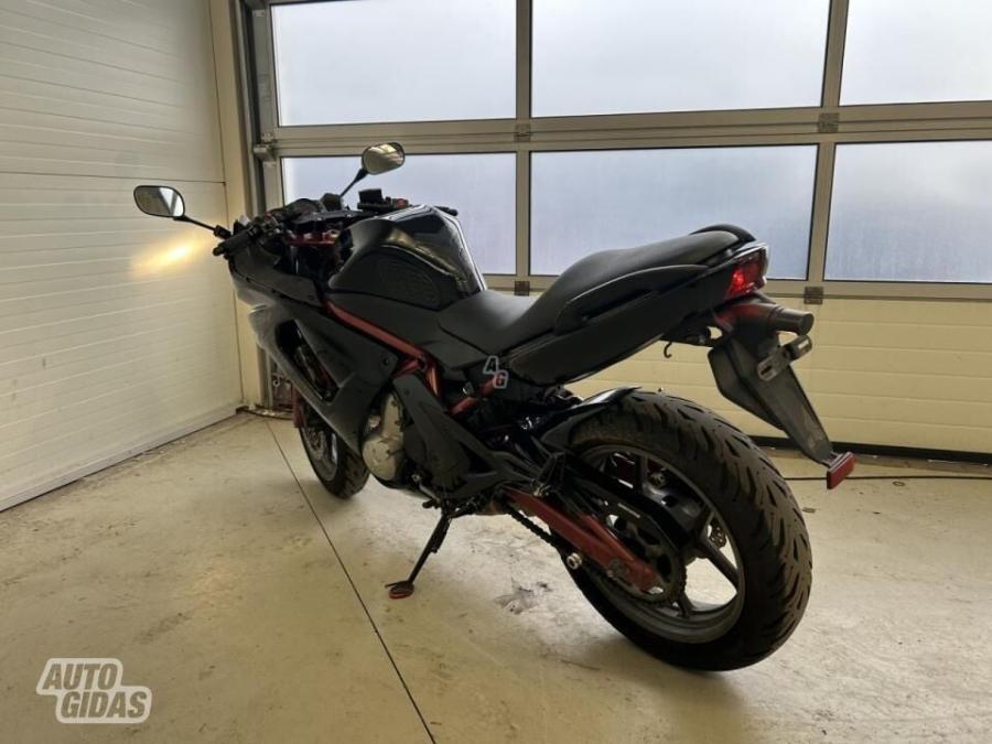 Black Kawasaki ER 2007 in Radviliskis, with an engine capacity of 0.65 L and mileage of 63 thousand km for 1650 €, photo 5 on AUTOMOTO.COM.LV