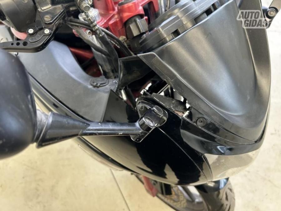 Black Kawasaki ER 2007 in Radviliskis, with an engine capacity of 0.65 L and mileage of 63 thousand km for 1650 €, photo 11 on AUTOMOTO.COM.LV