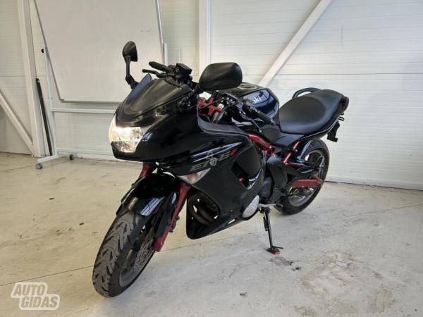 Black Kawasaki ER 2007 in Radviliskis, with an engine capacity of 0.65 L and mileage of 63 thousand km for 1550 €, photo 1 on AUTOMOTO.COM.LV