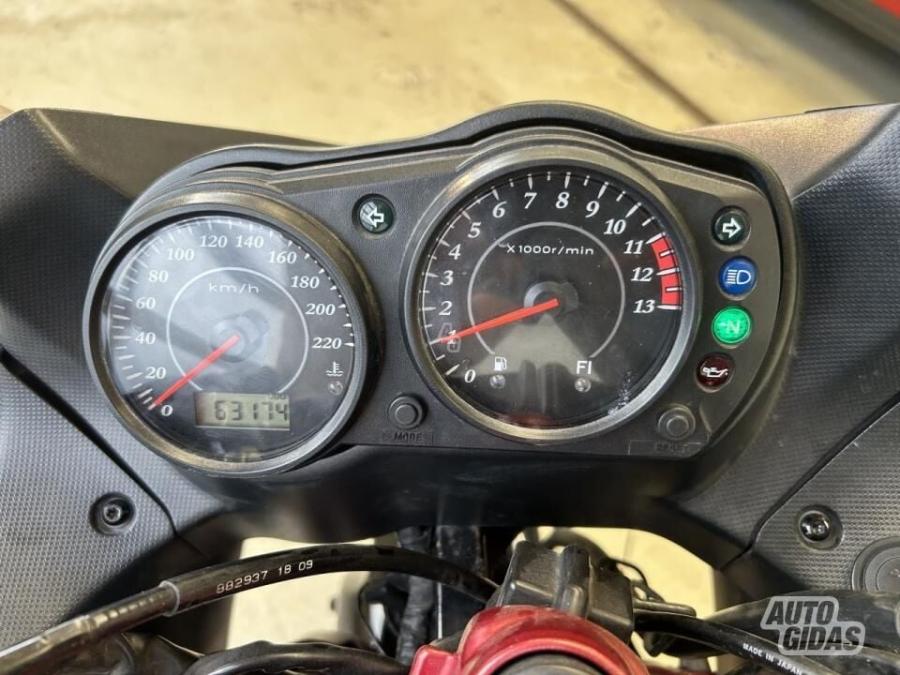Black Kawasaki ER 2007 in Radviliskis, with an engine capacity of 0.65 L and mileage of 63 thousand km for 1550 €, photo 10 on AUTOMOTO.COM.LV
