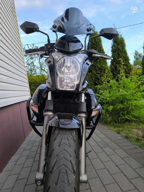 Black Kawasaki ER 2009 in Vilnius, with an engine capacity of 0.65 L and mileage of 52 thousand km for 3000 €, photo 2 on AUTOMOTO.COM.LV